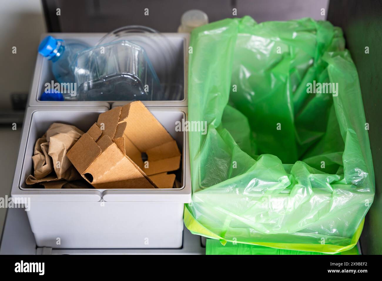 Household bins for waste sorting in the kitchen for recycle. Plastic ...