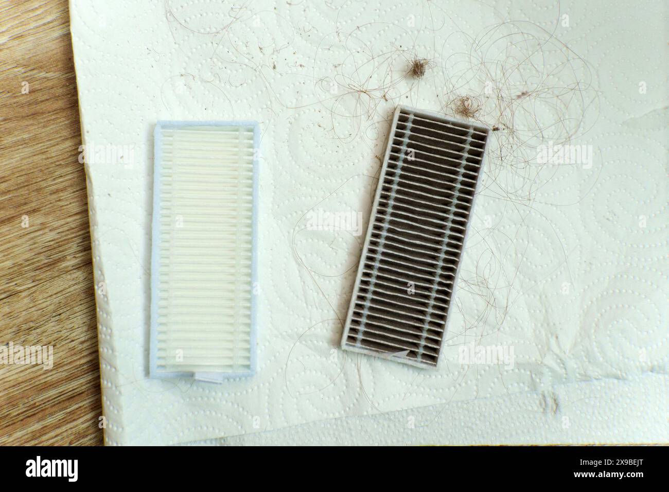 Robot vacuum filters lit home, showcasing the contrast between a ...