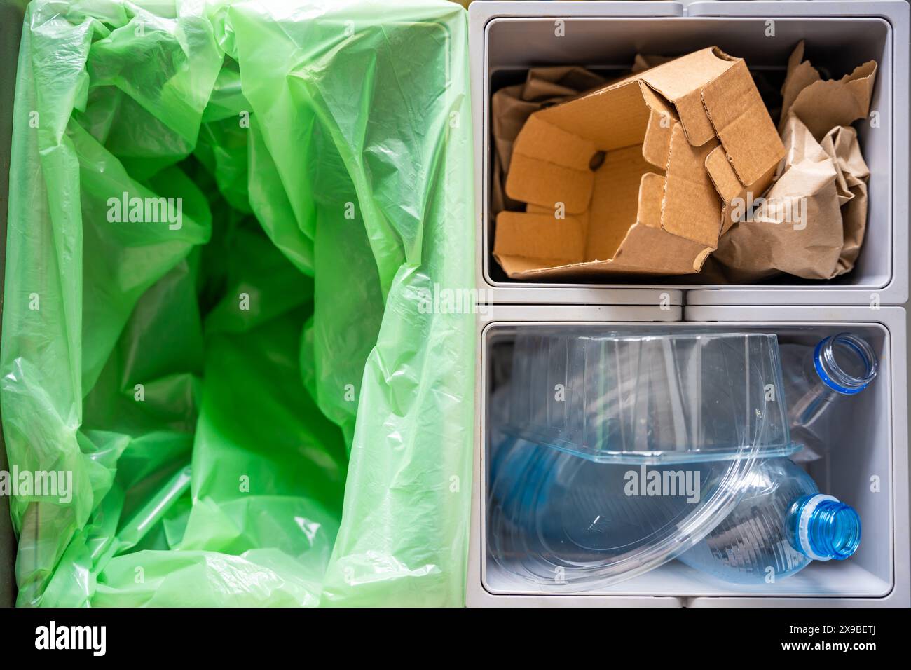 Household bins for waste sorting in the kitchen for recycle. Plastic ...