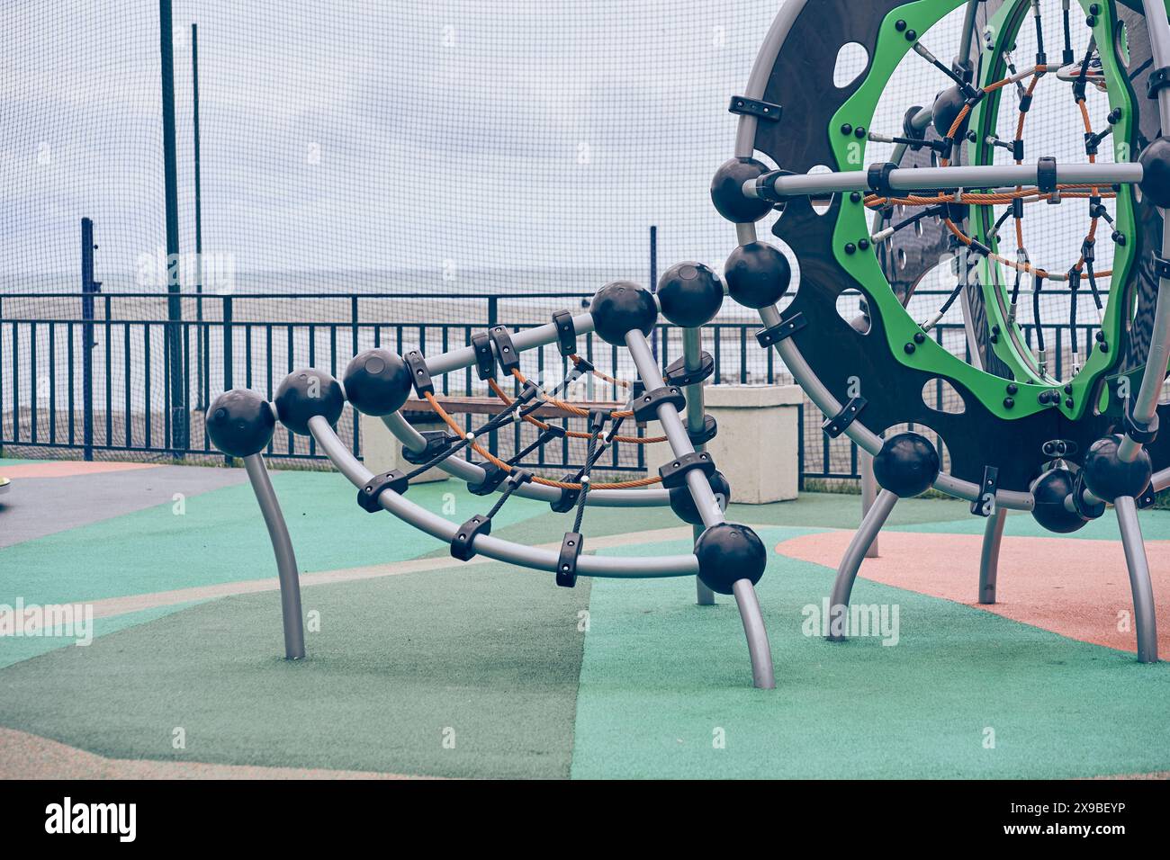 Alpine mesh on a metal base in the park on the playground. Covering for ...