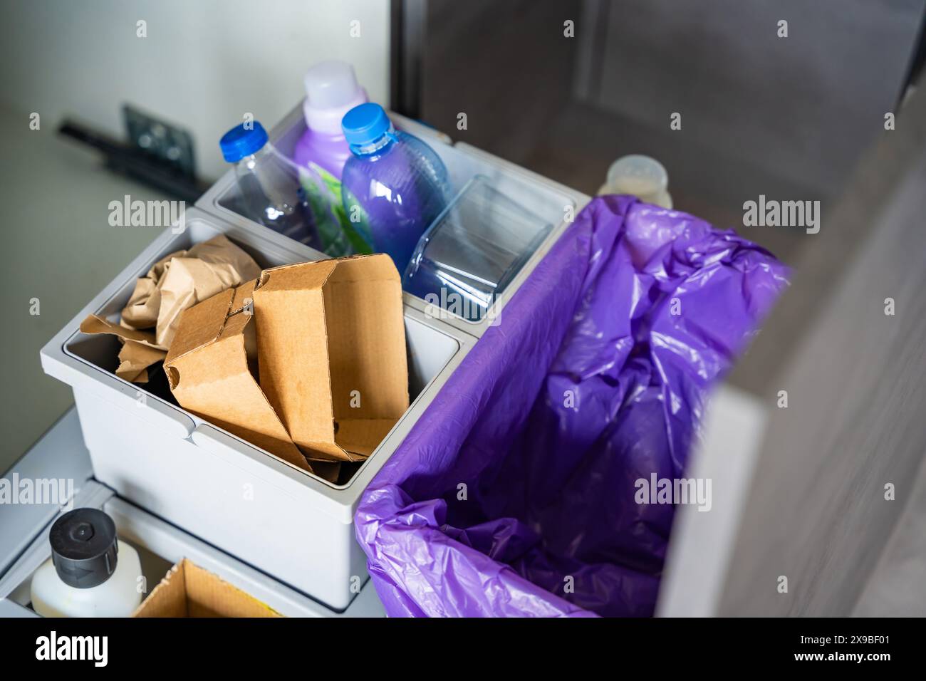 Household bins for waste sorting in the kitchen for recycle. Plastic ...