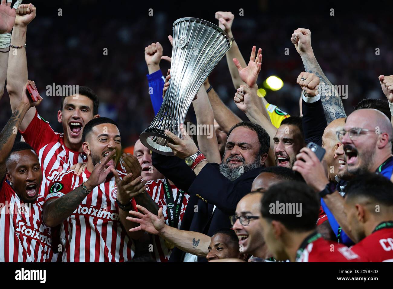 Olympiacos president Evangelos Marinakis lifts the trophy at the end of the 2023/2024 Conference ...