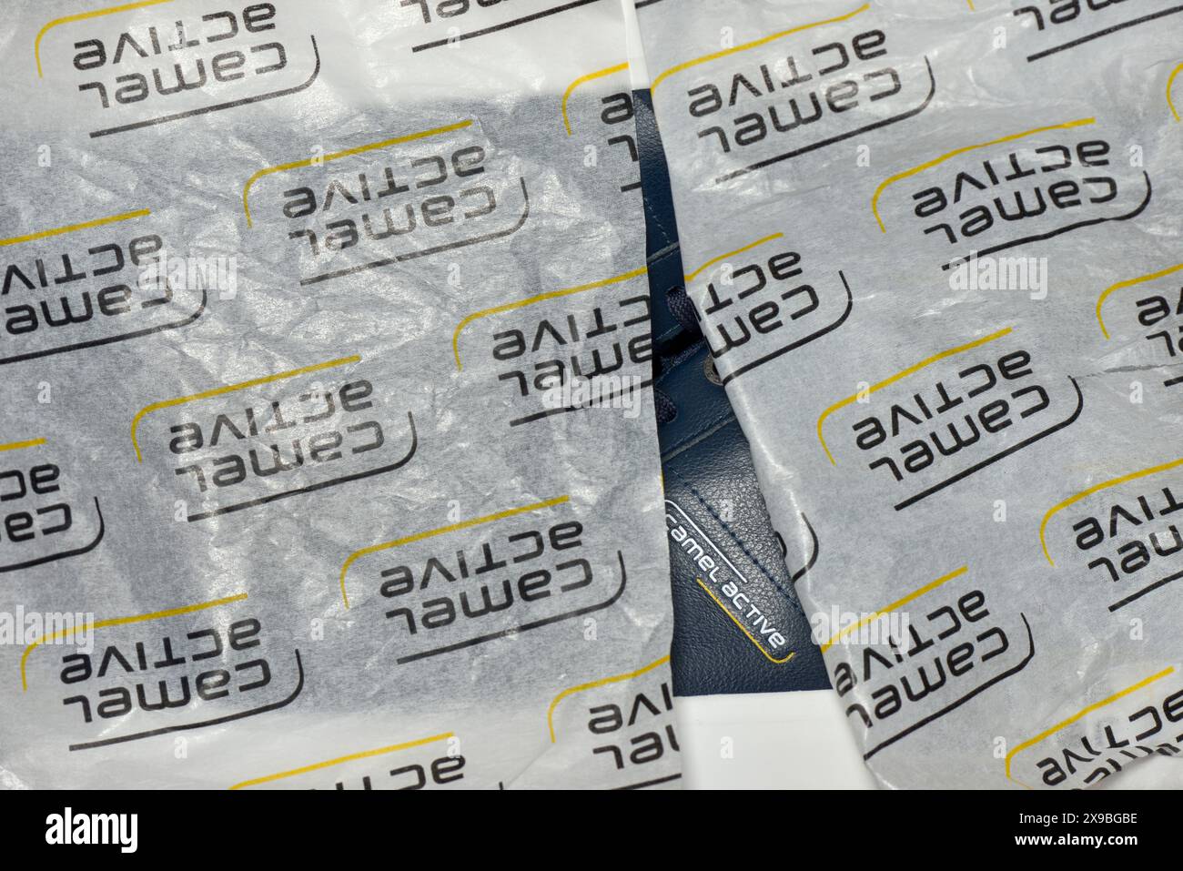 Camel Active shoes box wrapping packaging top view details Stock Photo - Alamy