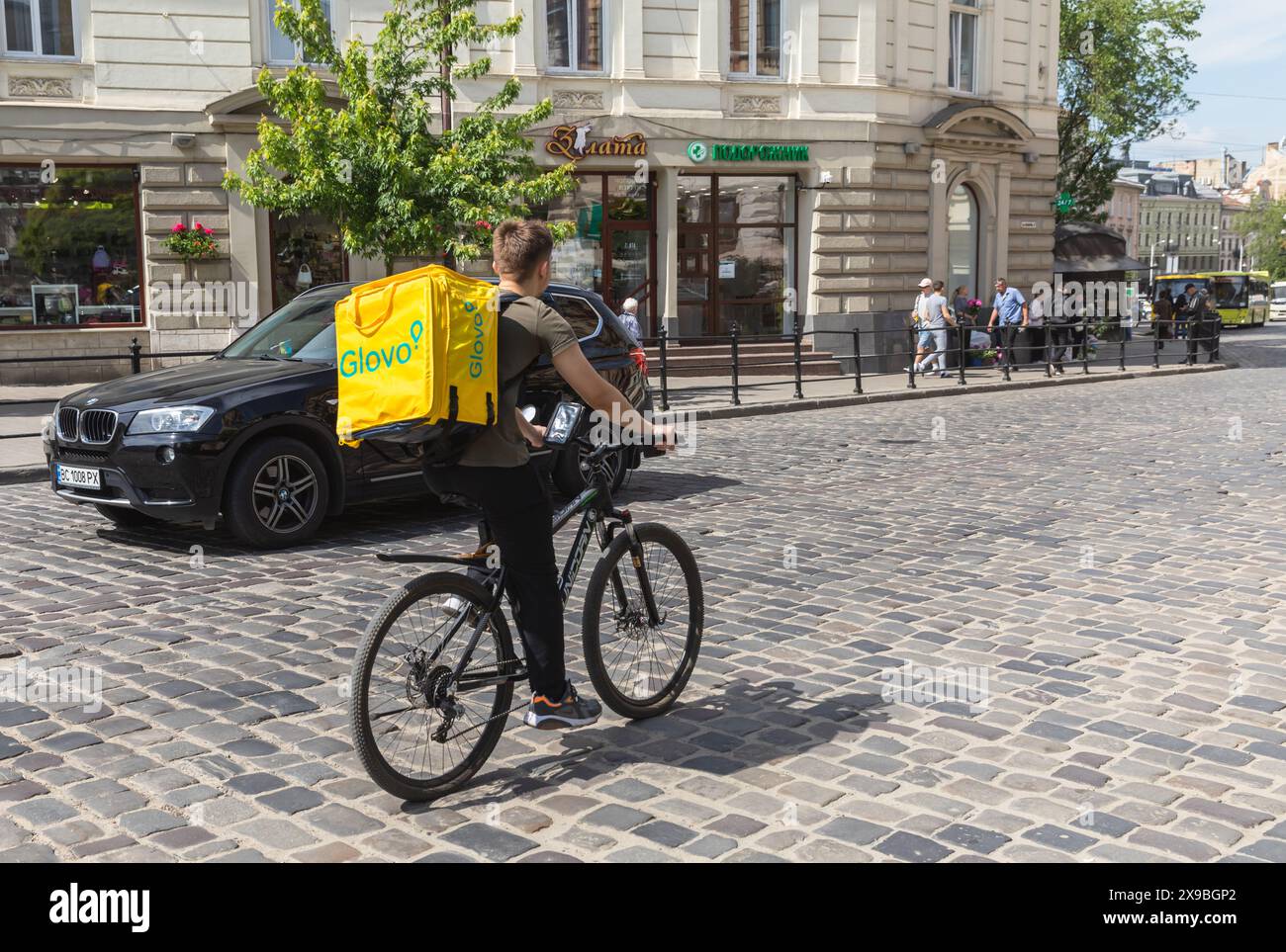 May 19, 2024, Lviv, Ukraine: A Glovo food delivery courier is seen ...
