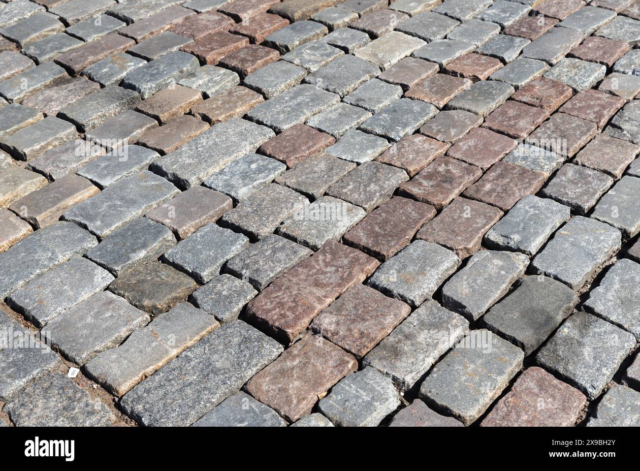 Background texture of an old granite cobblestone road Stock Photo - Alamy
