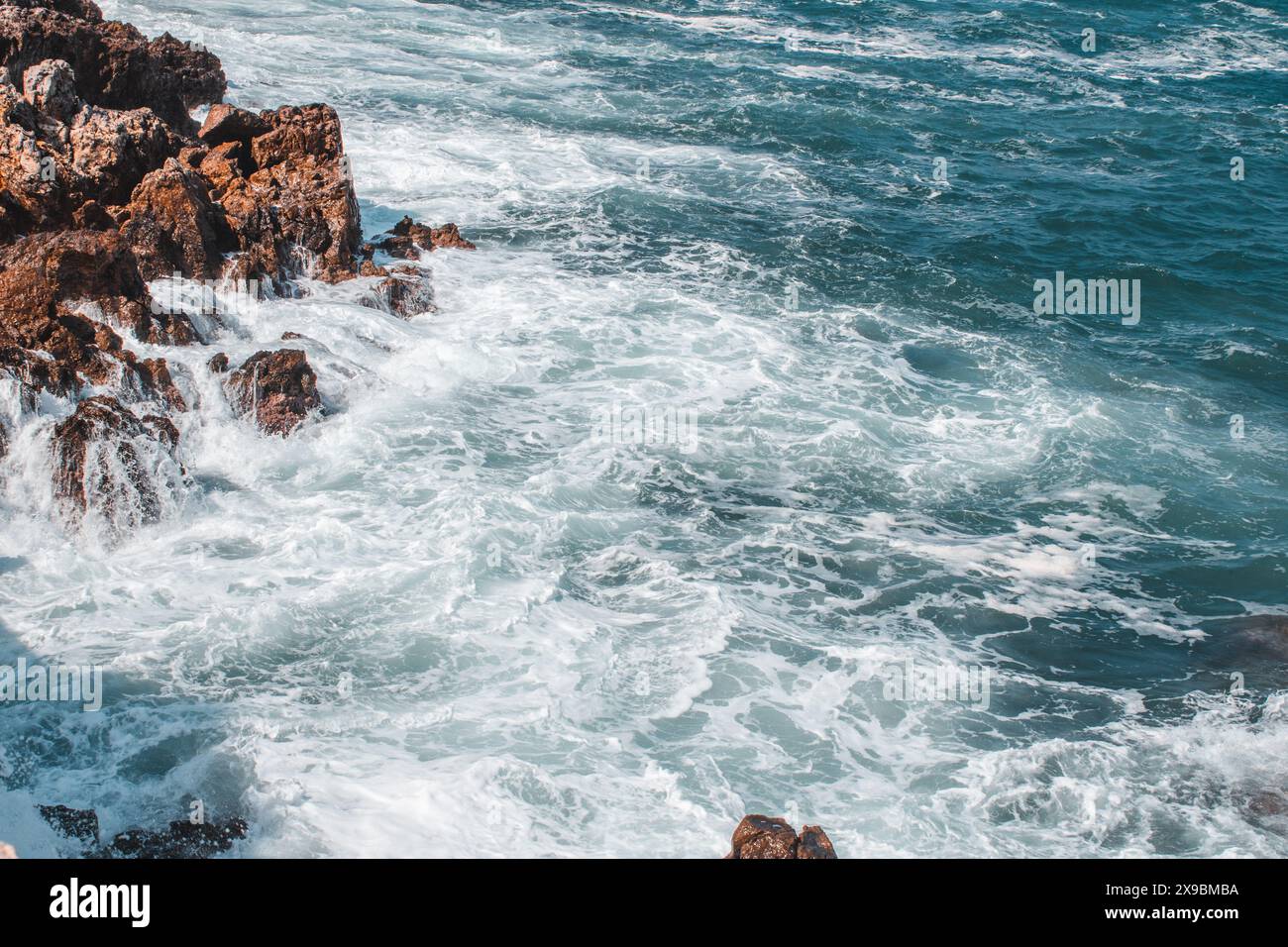 Water waves in the ocean cliffs Stock Photo - Alamy