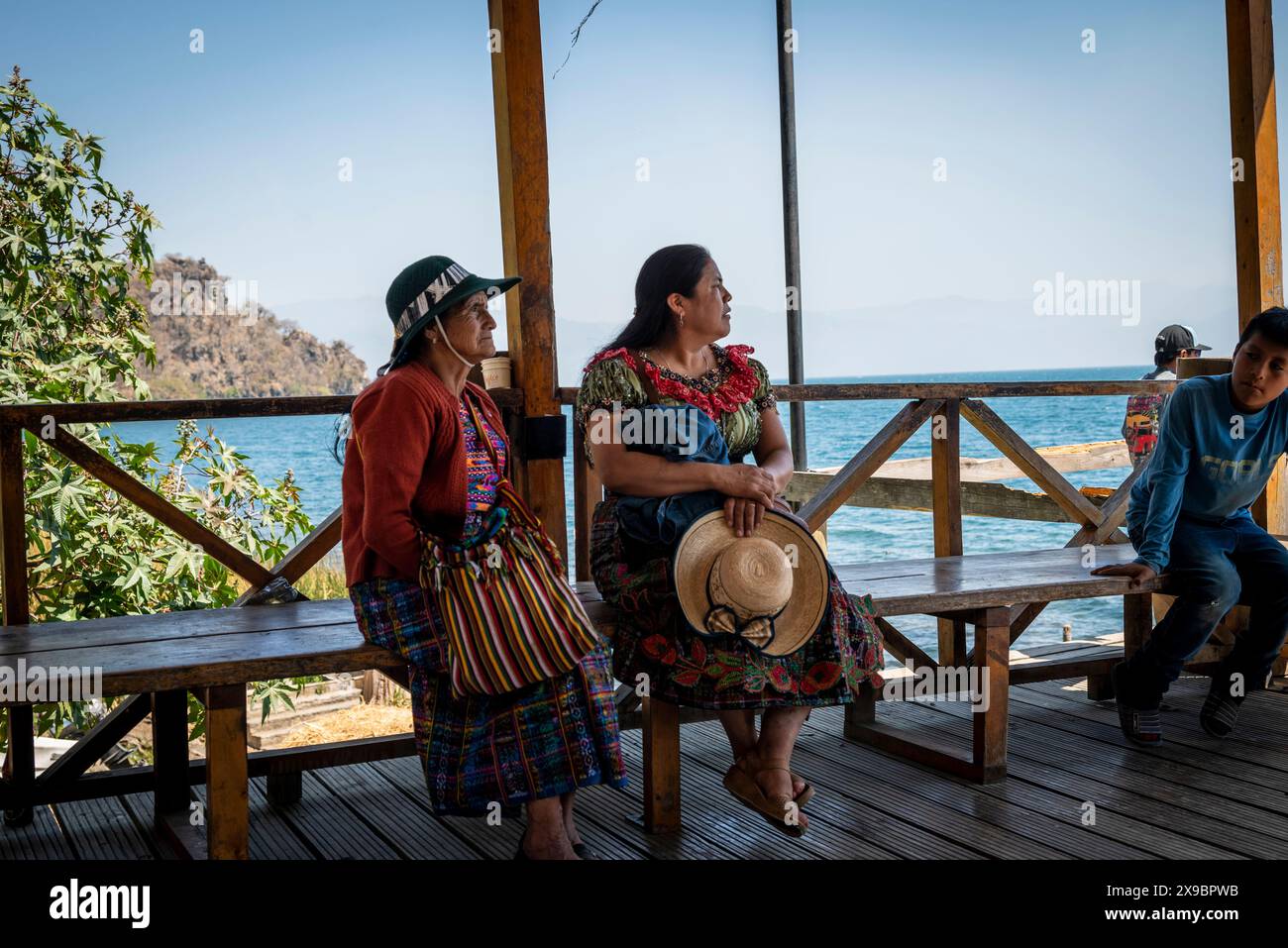 Mayan people waiting in the dock for a boat to arrive, San Marcos La ...