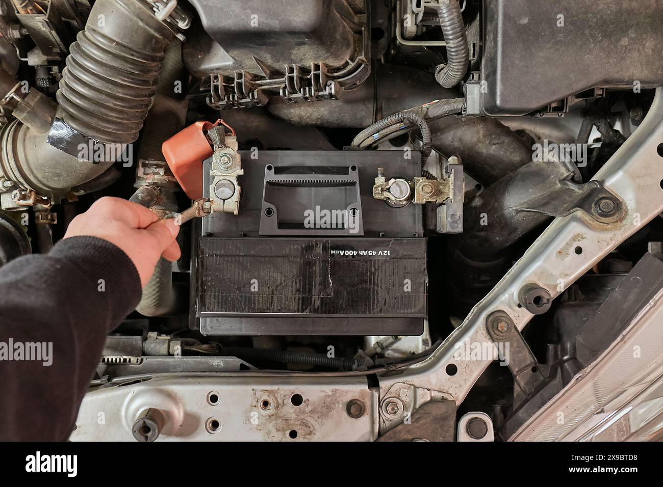 Car battery connecting cable terminal Stock Photo - Alamy