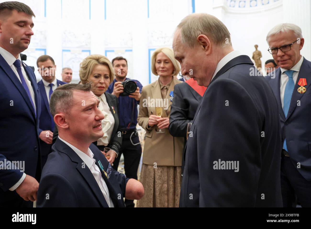 Russian President Vladimir Putin, right, and founder of the Aliaksei ...