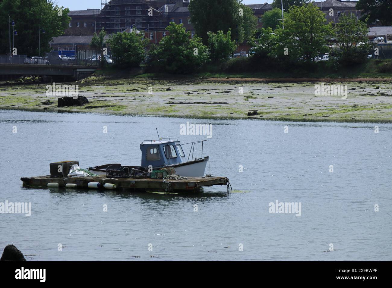 Gosport, Hampshire, England. 17 May 2024. A small boat tethered to a ...