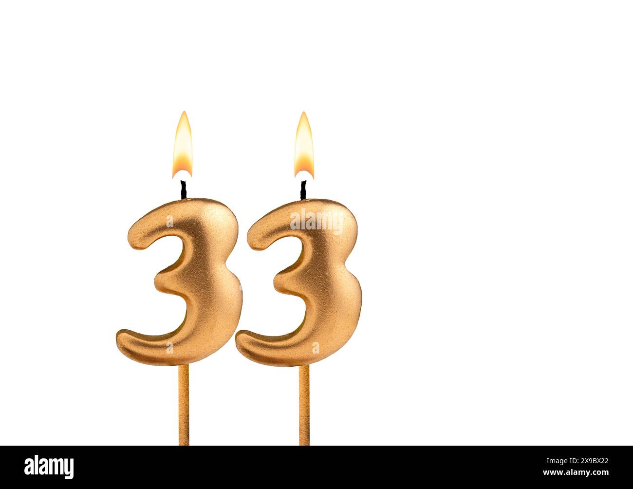 Golden candle number 33 - Birthday on white background Stock Photo - Alamy
