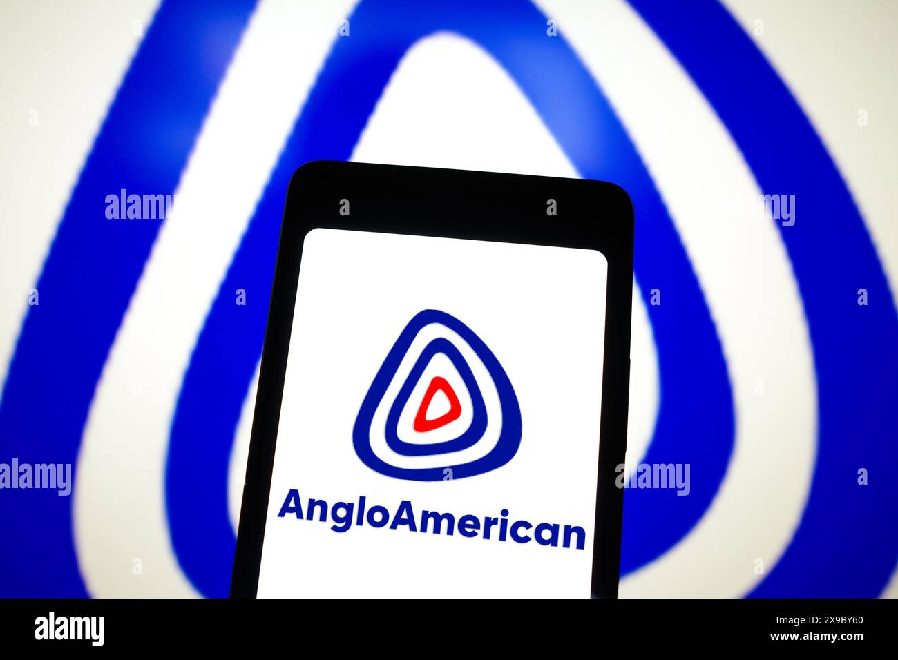 In this photo illustration, the Anglo American logo is displayed on a ...