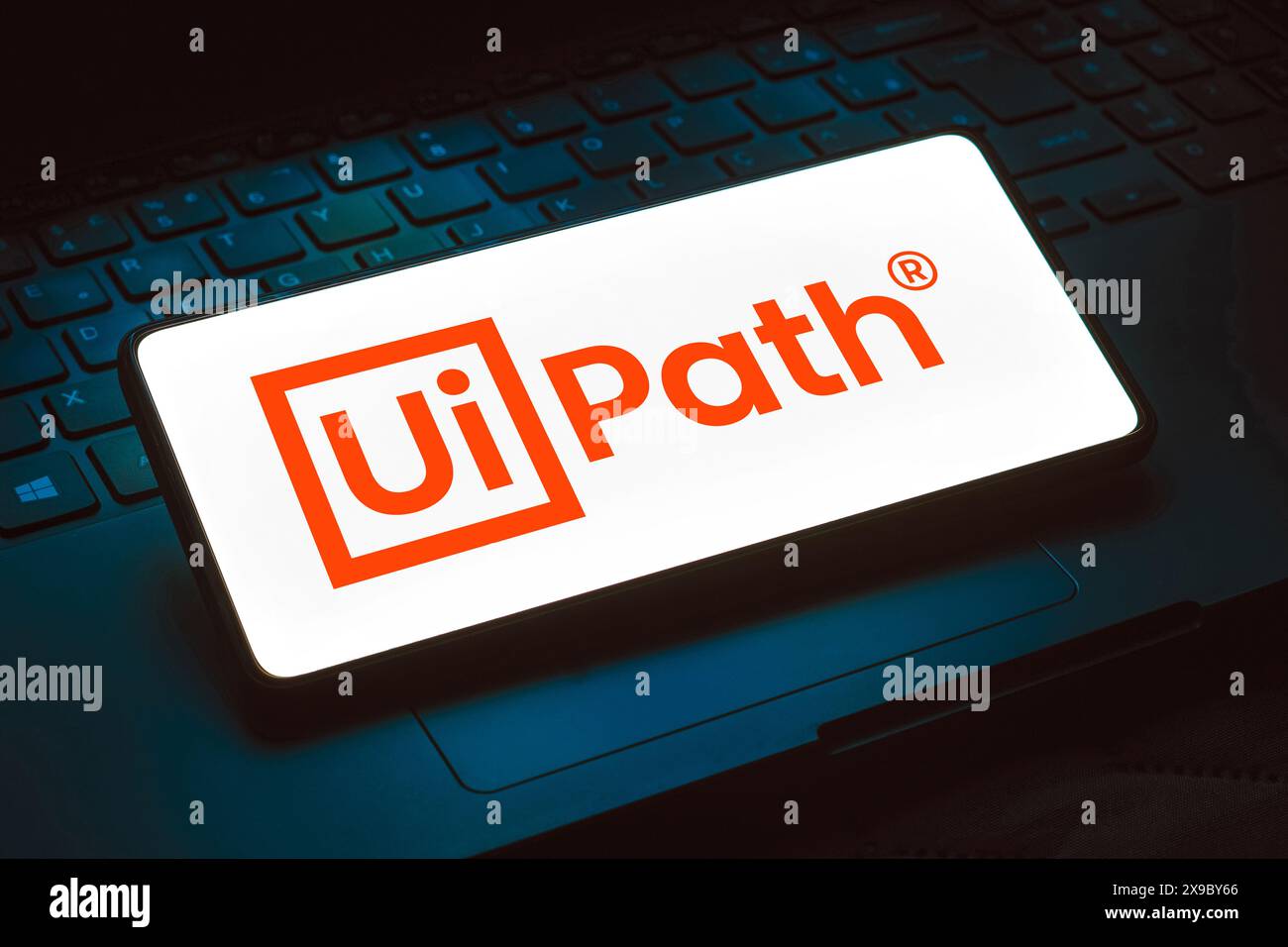 In this photo illustration, the UiPath logo is displayed on a ...