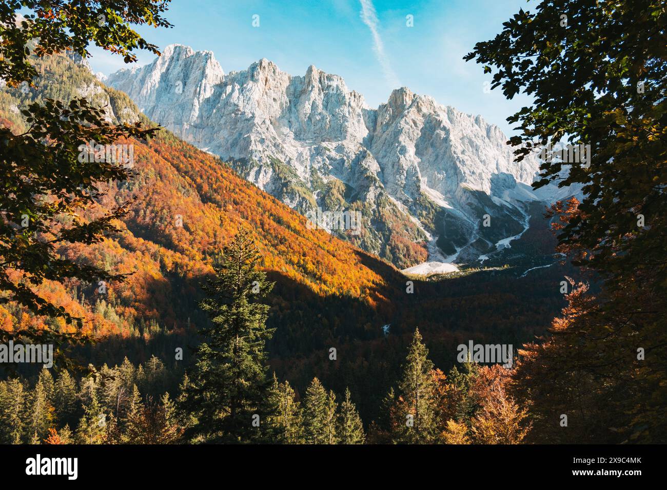 A scenic view of the Julian Alps in Slovenia, with striking autumn ...