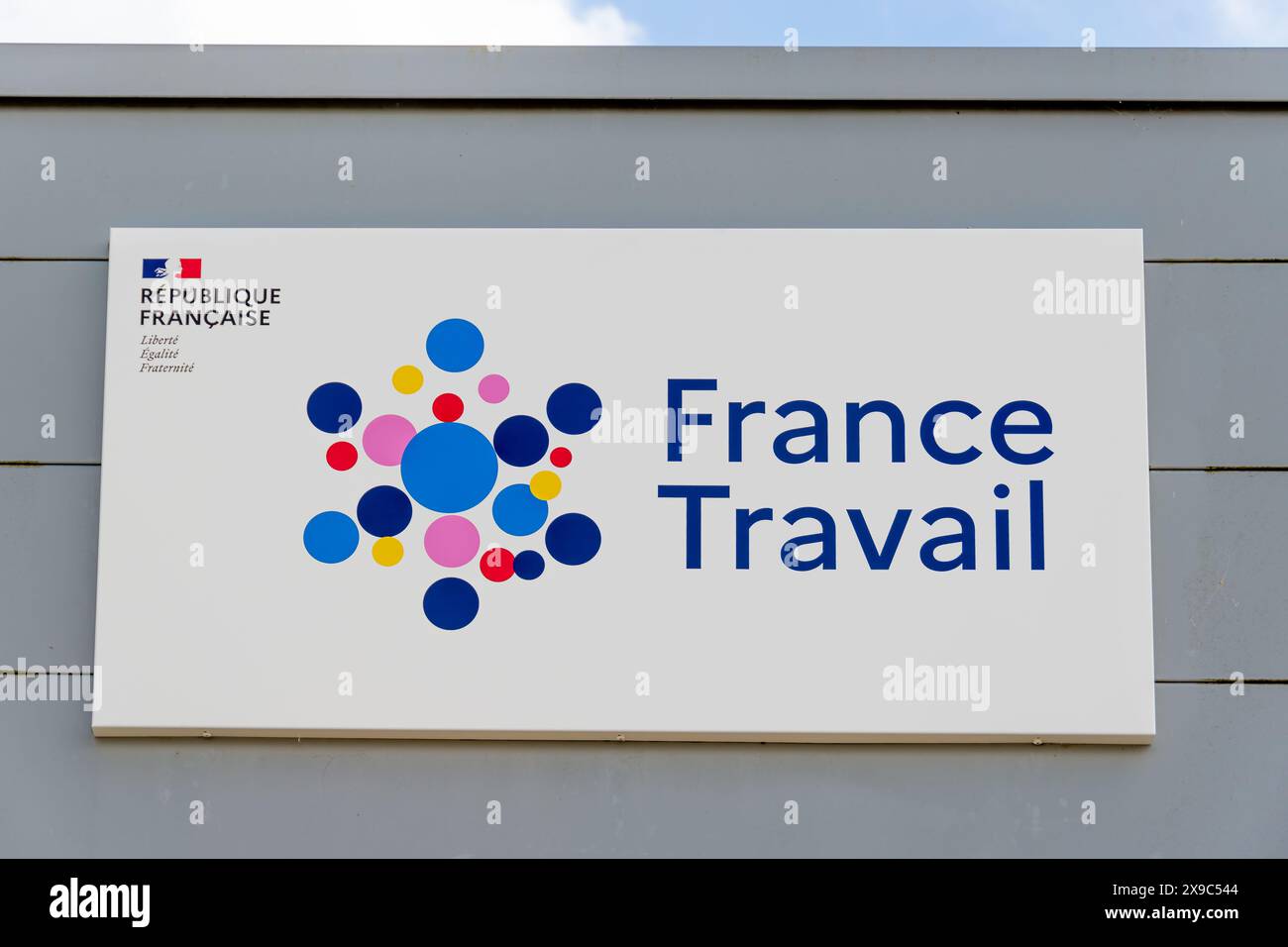 Sign and logo at the entrance to a France Travail agency. France ...