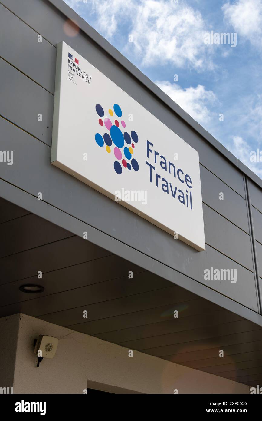 Sign and logo at the entrance to a France Travail agency. France ...