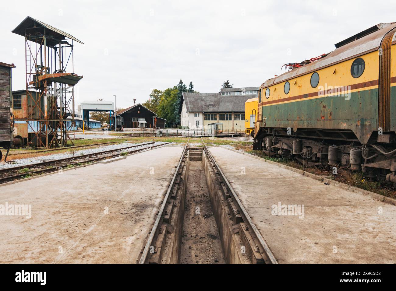 rusted, disused rail carriages and equipment at the Slovenian Railway ...