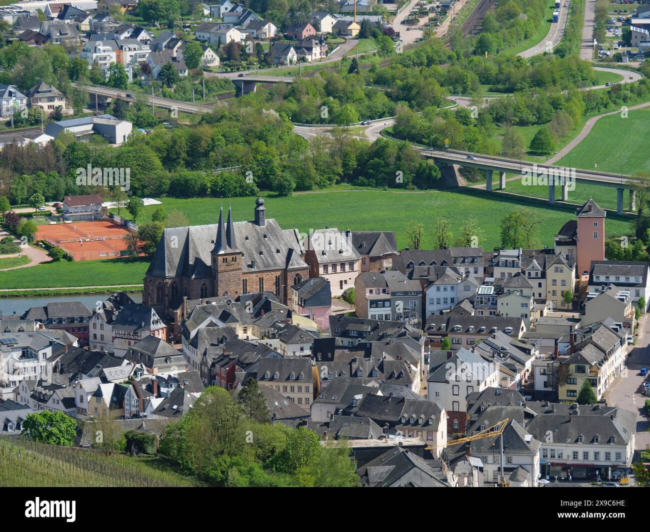 An old town with a church and many houses, surrounded by grassland ...