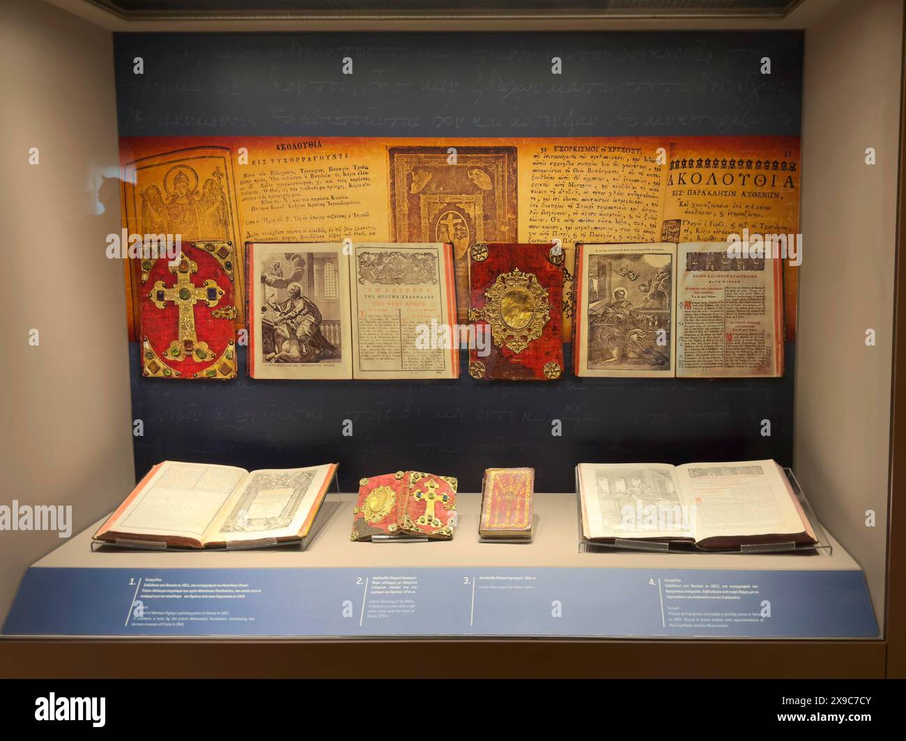 Showcase with historical handwritten books Gospels Church books of ...