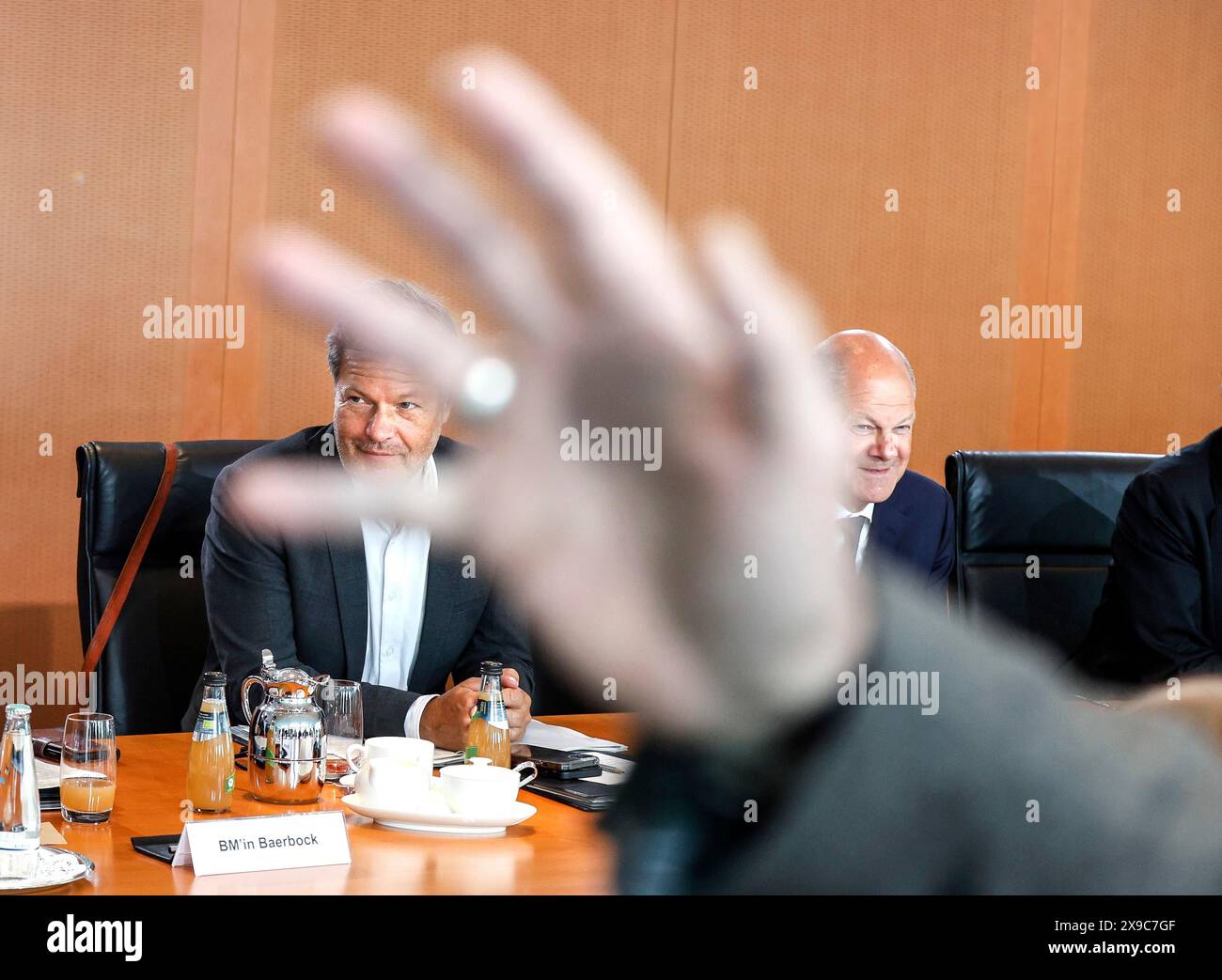 Federal Chancellor Olaf Scholz, right, at the beginning of the cabinet ...
