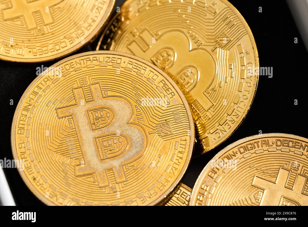 Bavaria, Germany - May 30, 2024: Close-up of Bitcoin gold coins. BTC ...