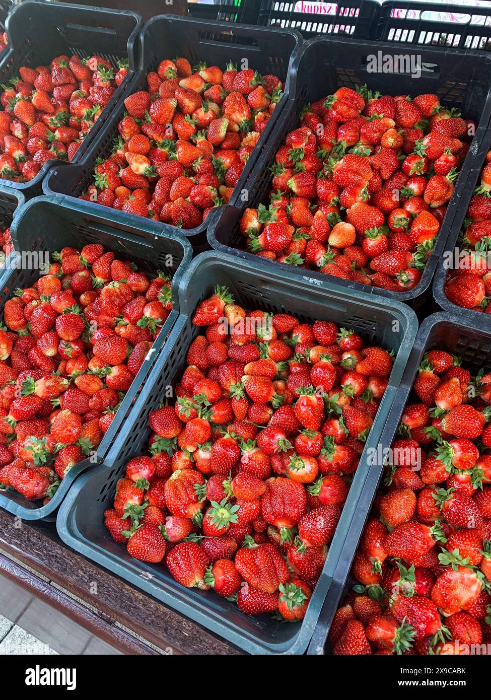 Strawberries in boxes on a farm market Stock Photo - Alamy