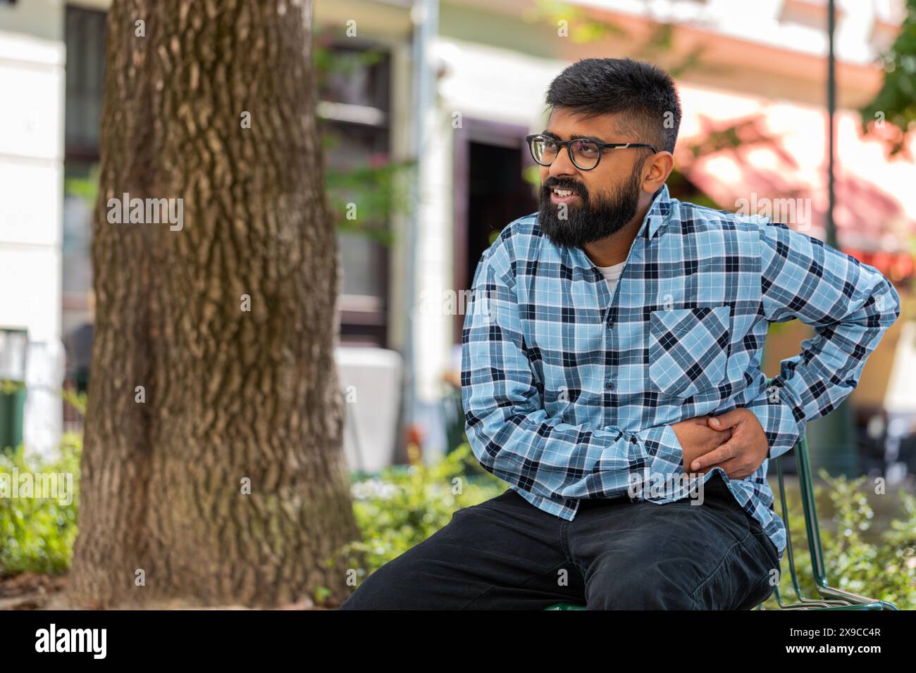 Indian man feeling sudden strong abdominal stomach liver kidney ache ...