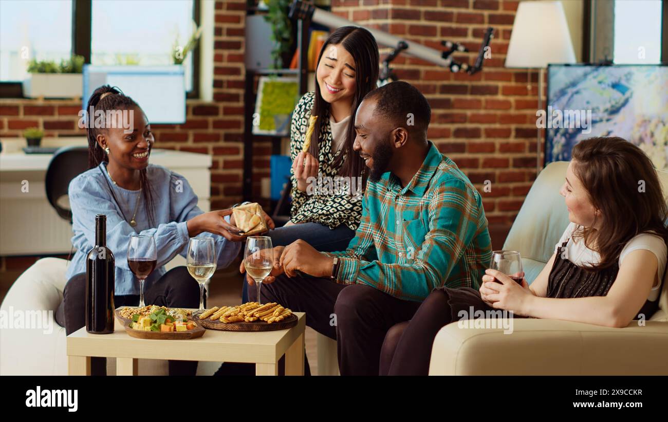 Multiracial friends throwing surprise birthday party forafrican ...