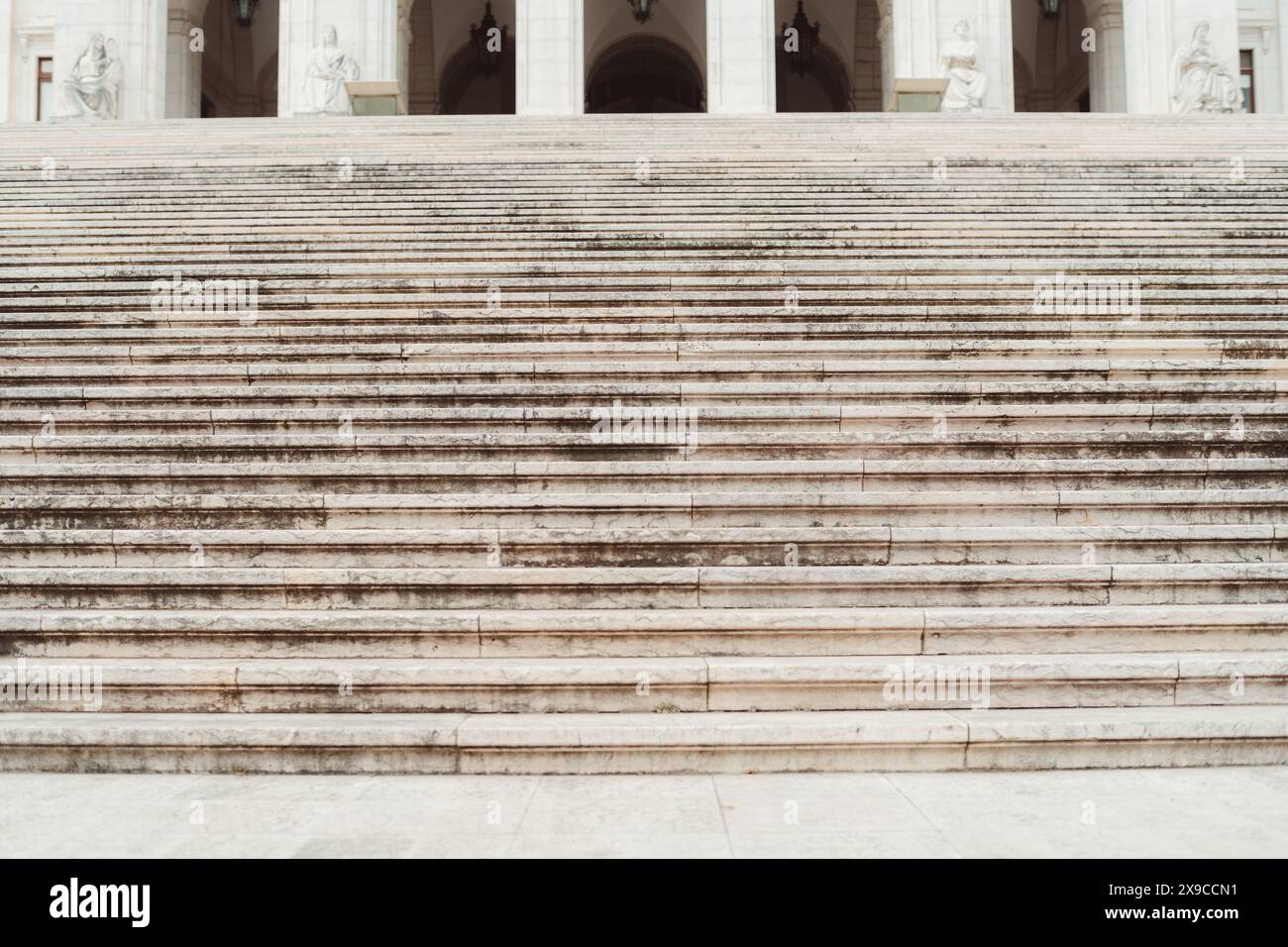 Wide stone steps leading up to the entrance of a grand building ...