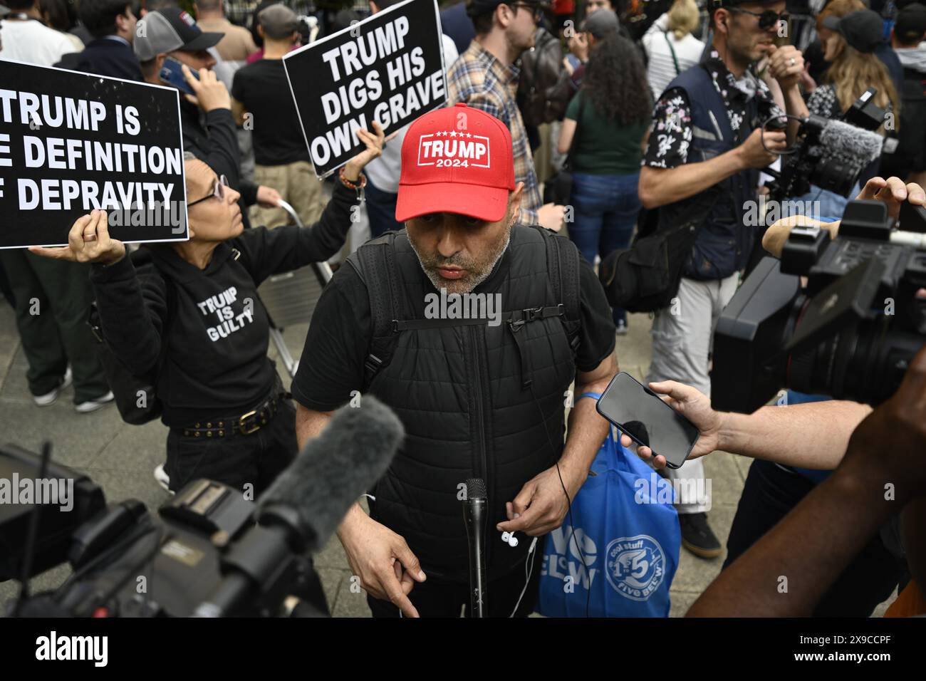 New York, New York, USA. 30th May, 2024. Reporters interview Trump ...