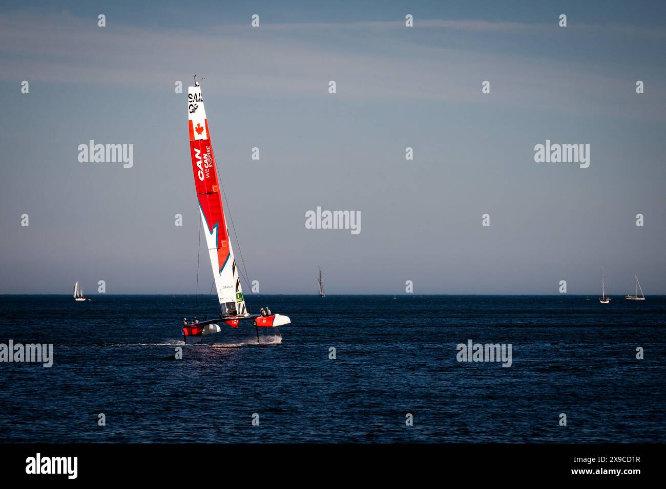 Bluenose II in the background of Sail GP's Team Canada catamaran ...