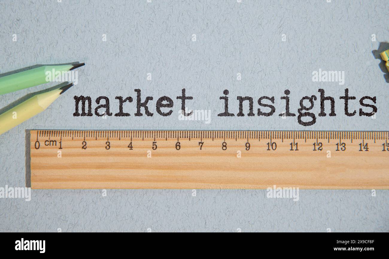 Text MARKET INSIGHT on sticky notes with copy space and paper clip ...