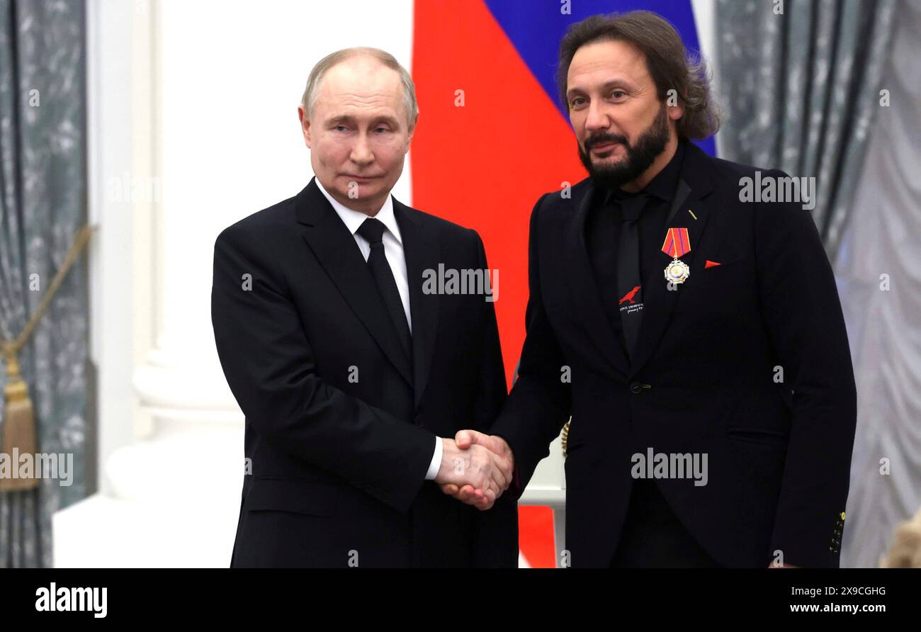 Moscow, Russia. 30th May, 2024. Russian President Vladimir Putin, left ...