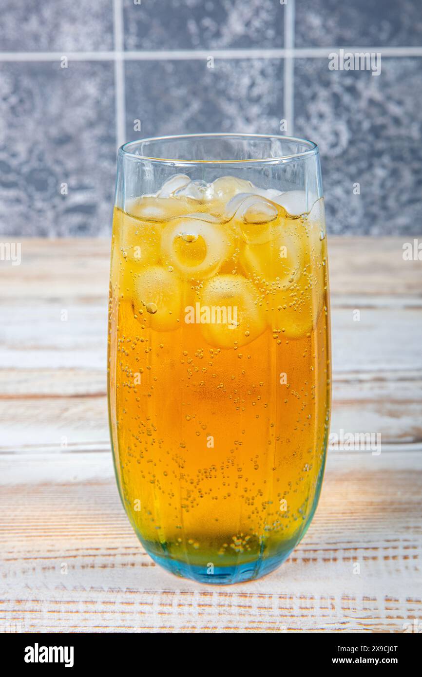 A glass of energetic drink consisting of energy drink and ice. Iced ...