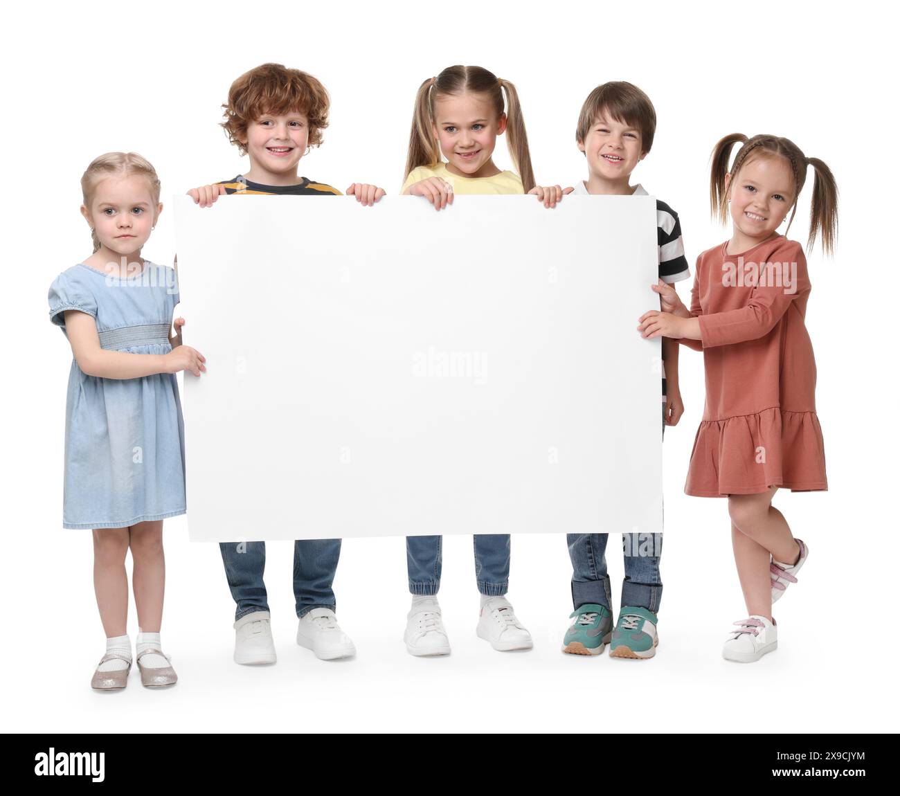 Group of children with blank poster on white background. Mockup for ...