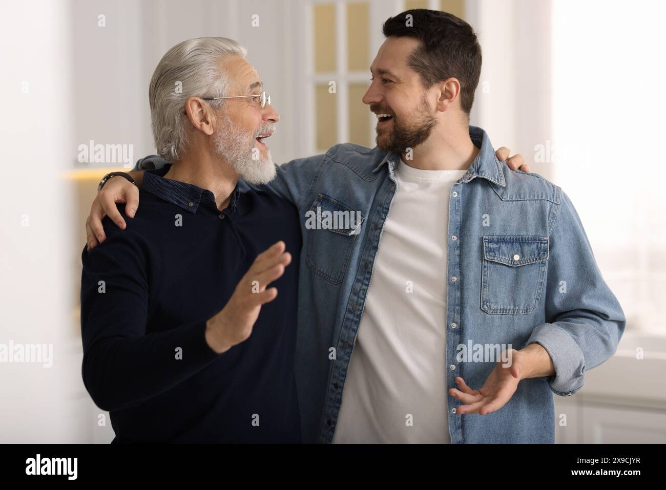 Dad and son talking laughing hi-res stock photography and images - Alamy
