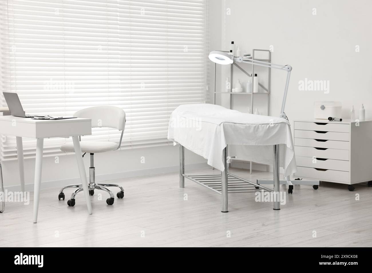 Modern interior of dermatologist's office with examination table Stock ...