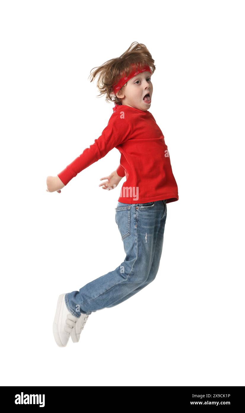 Happy little boy dancing on white background Stock Photo - Alamy