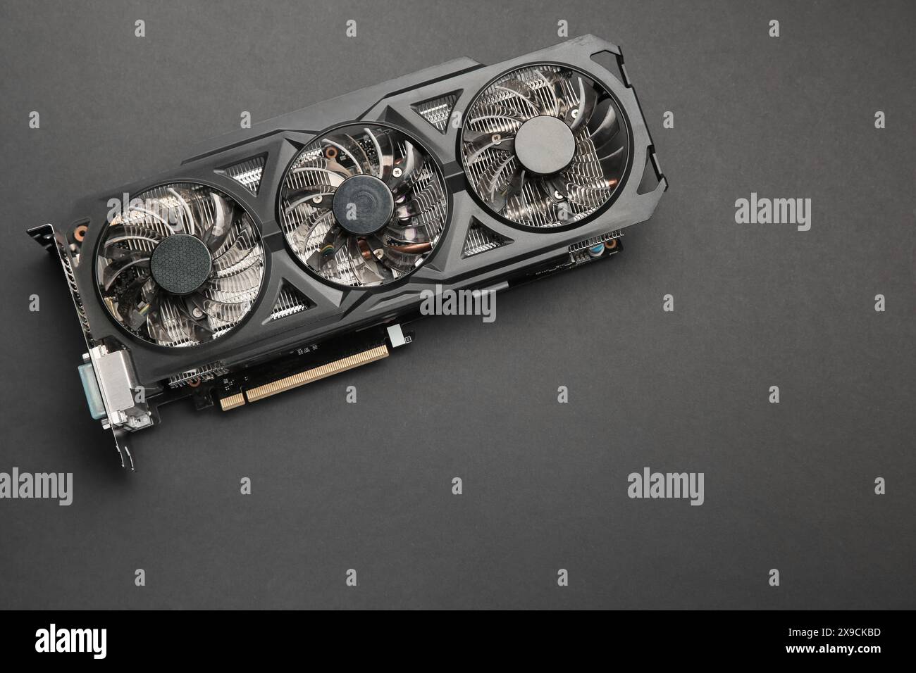 One graphics card on black background, top view. Space for text Stock ...