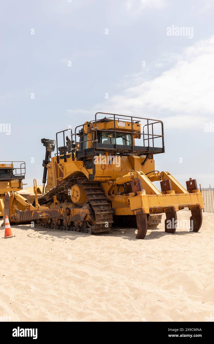 Yellow Crawler Dozer On Sandy Beach, Blue Sky On Background. Bulldozer ...