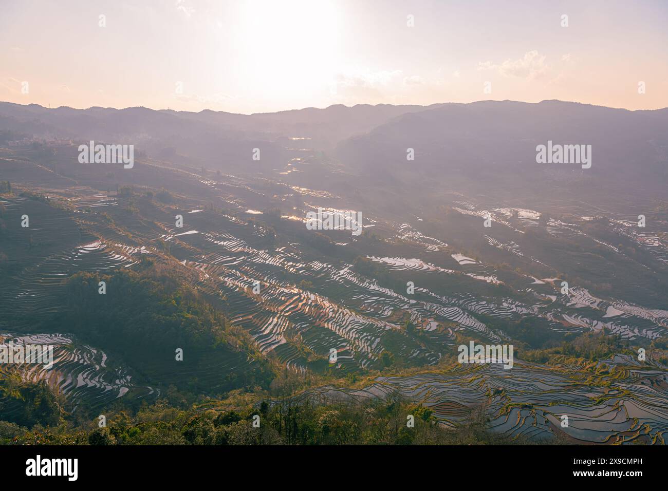 Sunset over Bada rice terraces in Yuanyang rice terraces, Yunnan, China ...