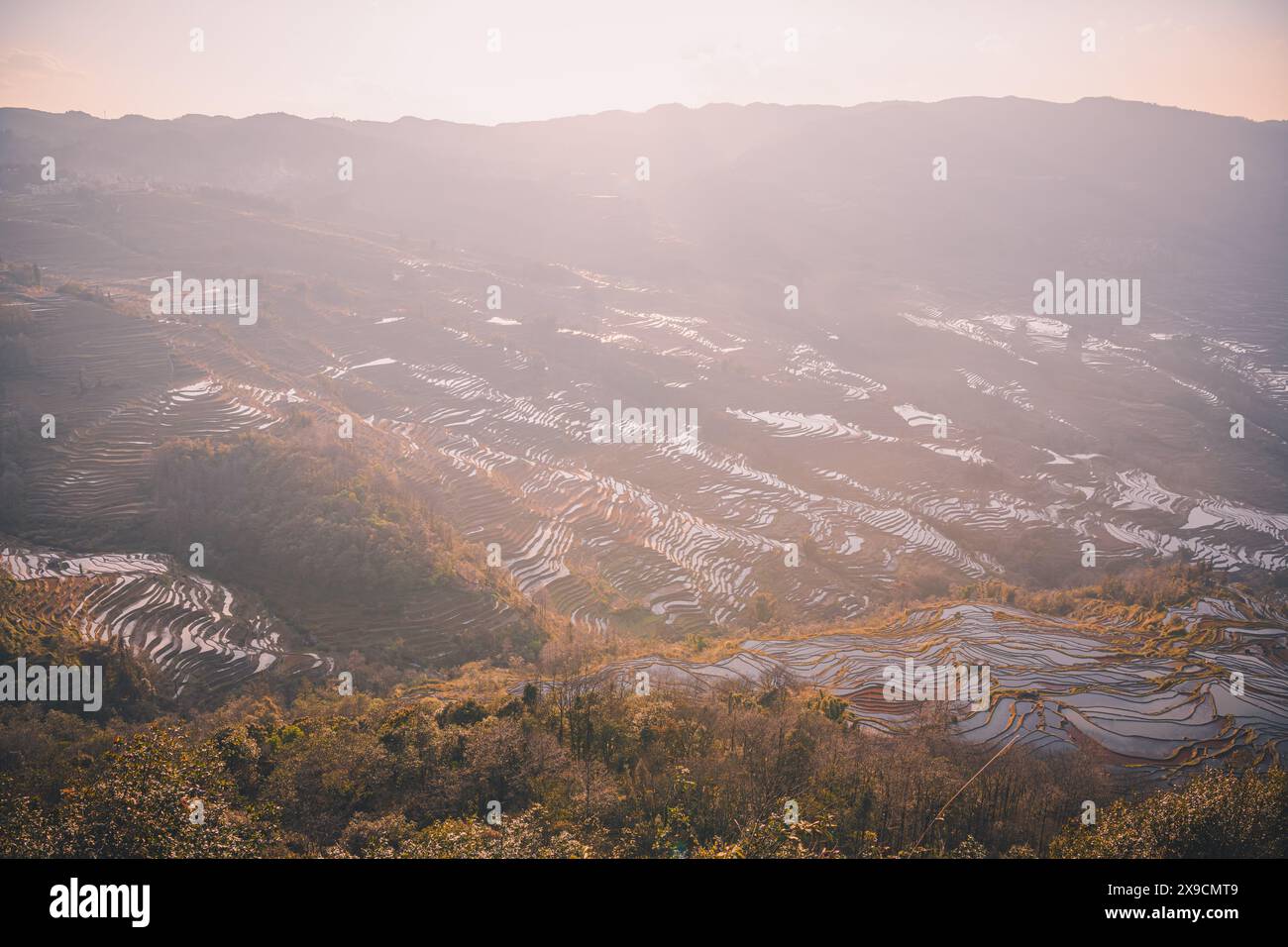 Sunset over YuanYang rice terraces in Yunnan, China, one of the latest ...