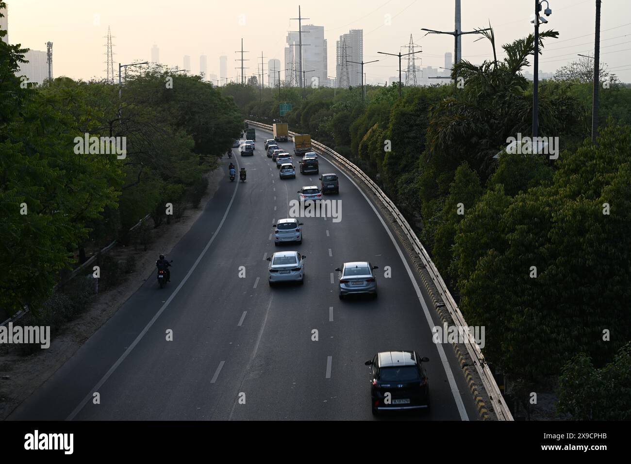 Showcase the six-lane highway stretching into the distance ...