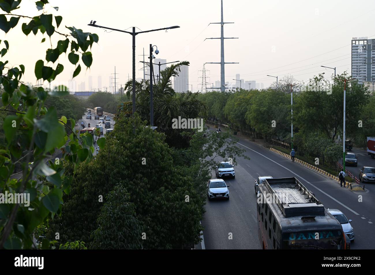 Showcase the six-lane highway stretching into the distance ...