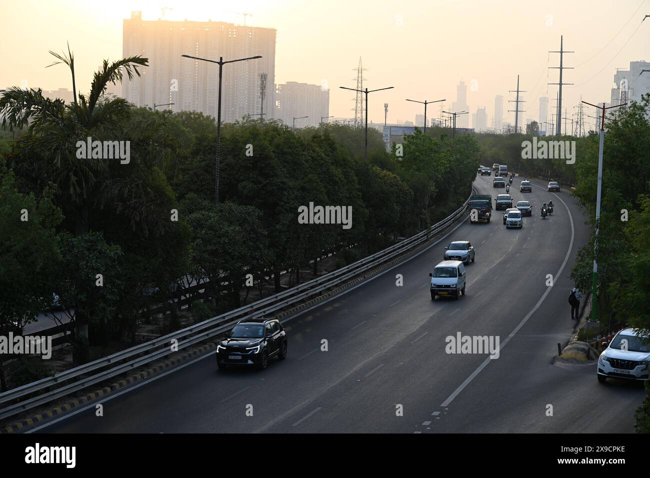 Showcase the six-lane highway stretching into the distance ...