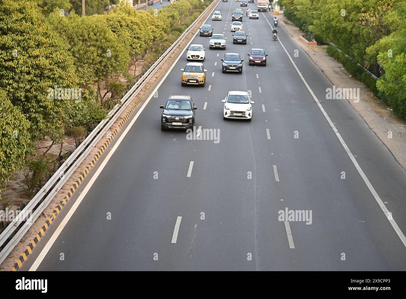 Showcase The Six Lane Highway Stretching Into The Distance Highlighting The Smooth Flow Of
