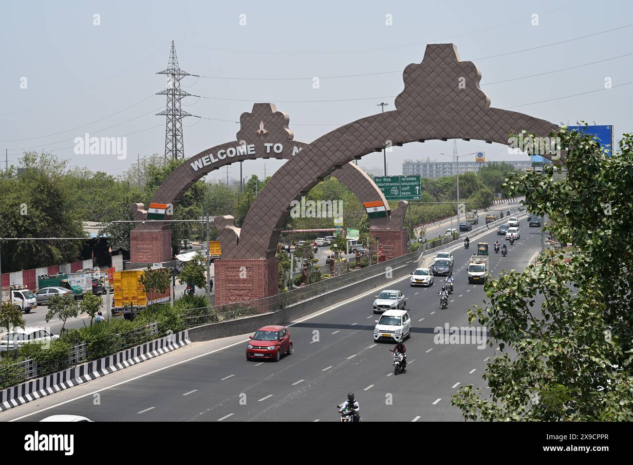 Capture high-resolution images showcasing the Noida entry gate near the ...