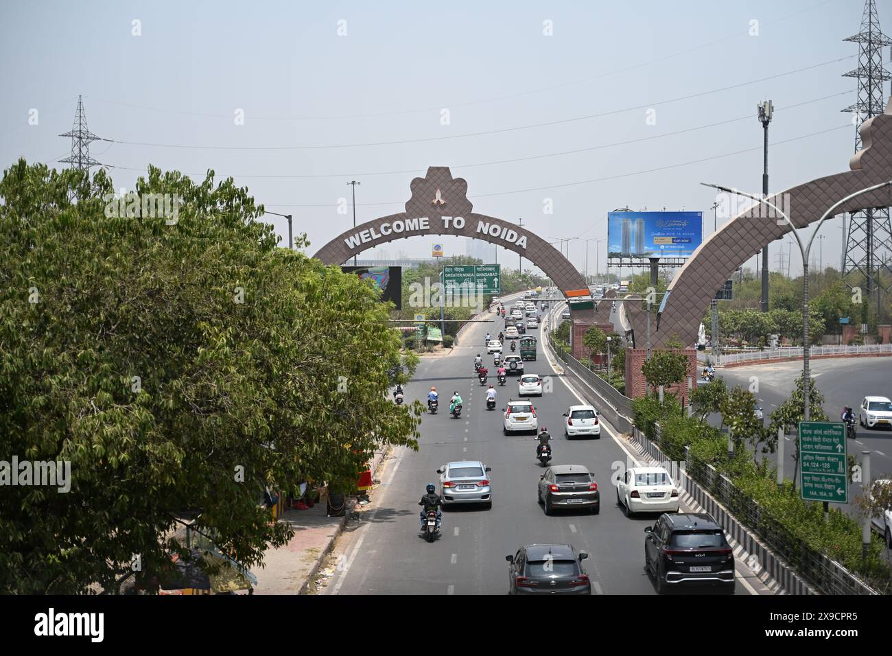 Capture high-resolution images showcasing the Noida entry gate near the ...