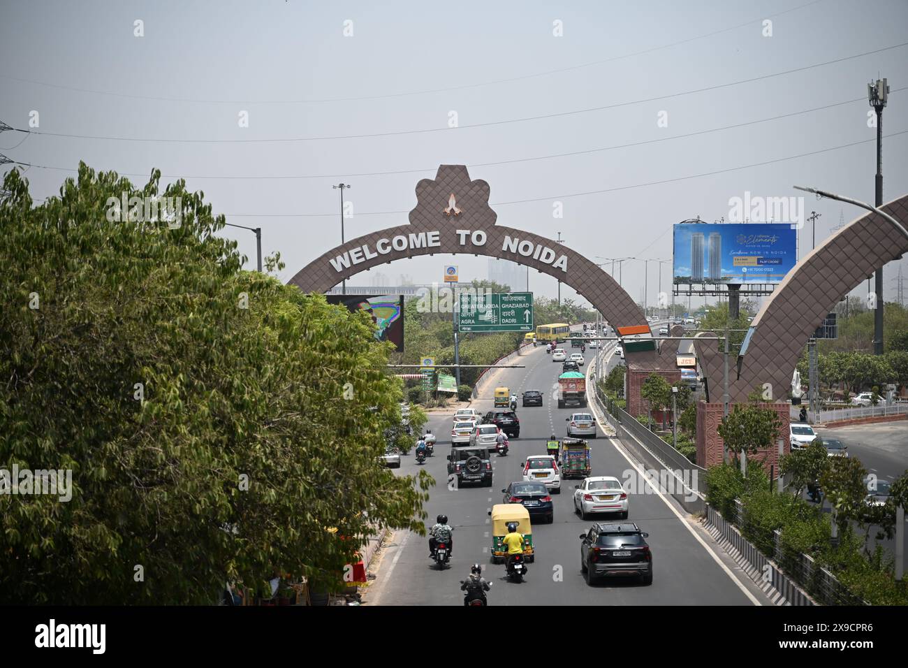 Capture high-resolution images showcasing the Noida entry gate near the ...