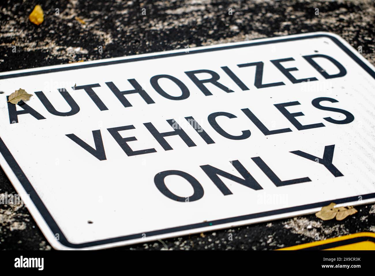 Authorized Vehicles Only Sign on the Ground Stock Photo - Alamy
